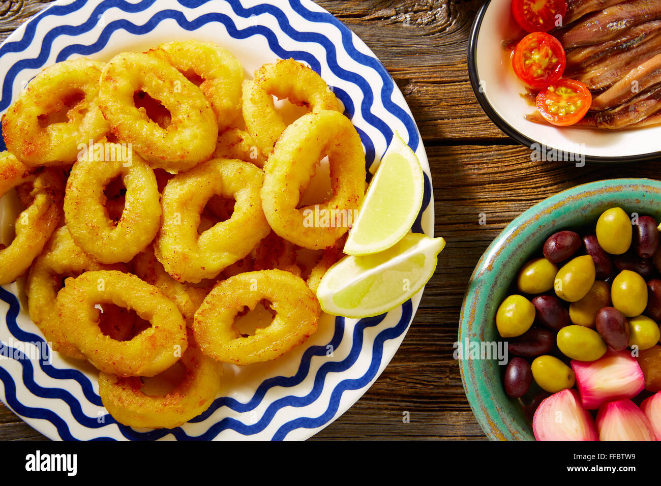 Tapas spanish seafood fried calamari spain Stock Photo - Alamy