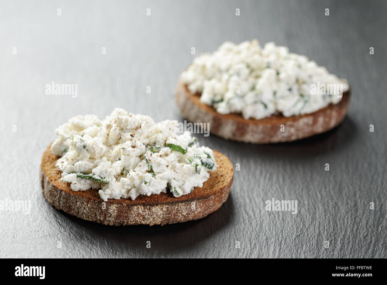 two rye sandwiches or bruschettarye open sandwich with cream cheese and ...