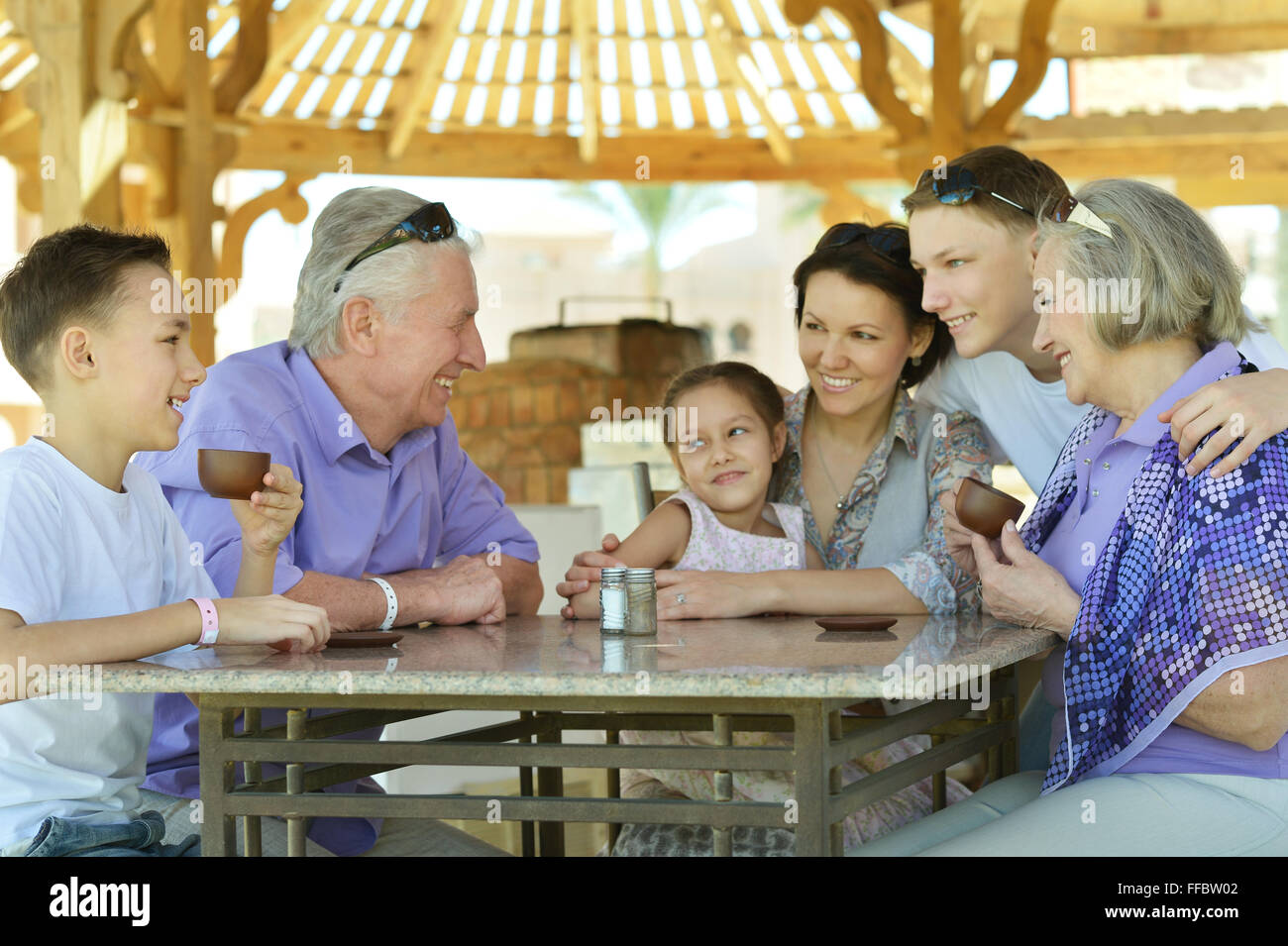 family drinking tea Stock Photo - Alamy