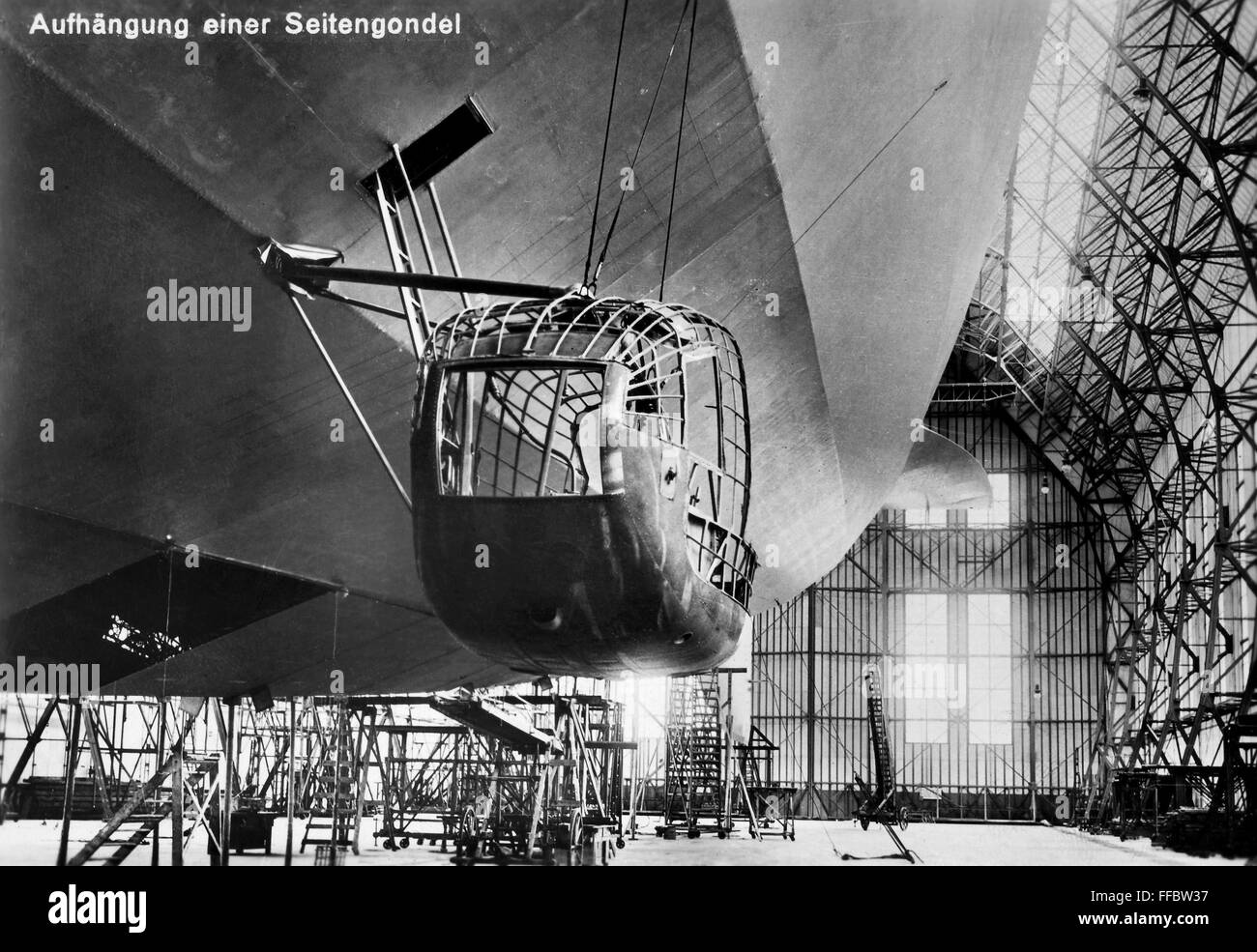 ZEPPELIN CONSTRUCTION. /nAttaching one of the side gondolas to the Graf ...