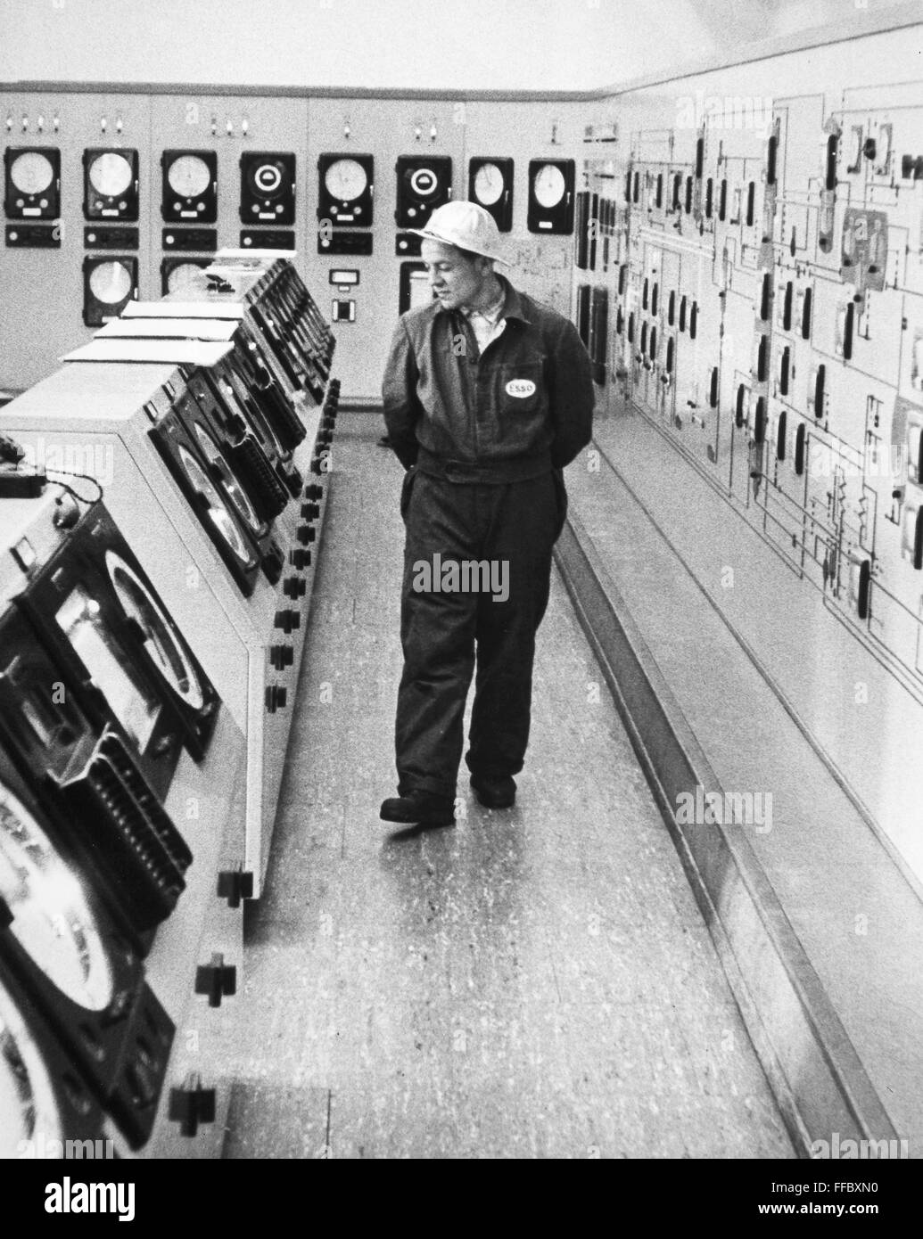GERMANY: AUTOMATION, 1957. /nWorker at the control boards of an ESSO ...