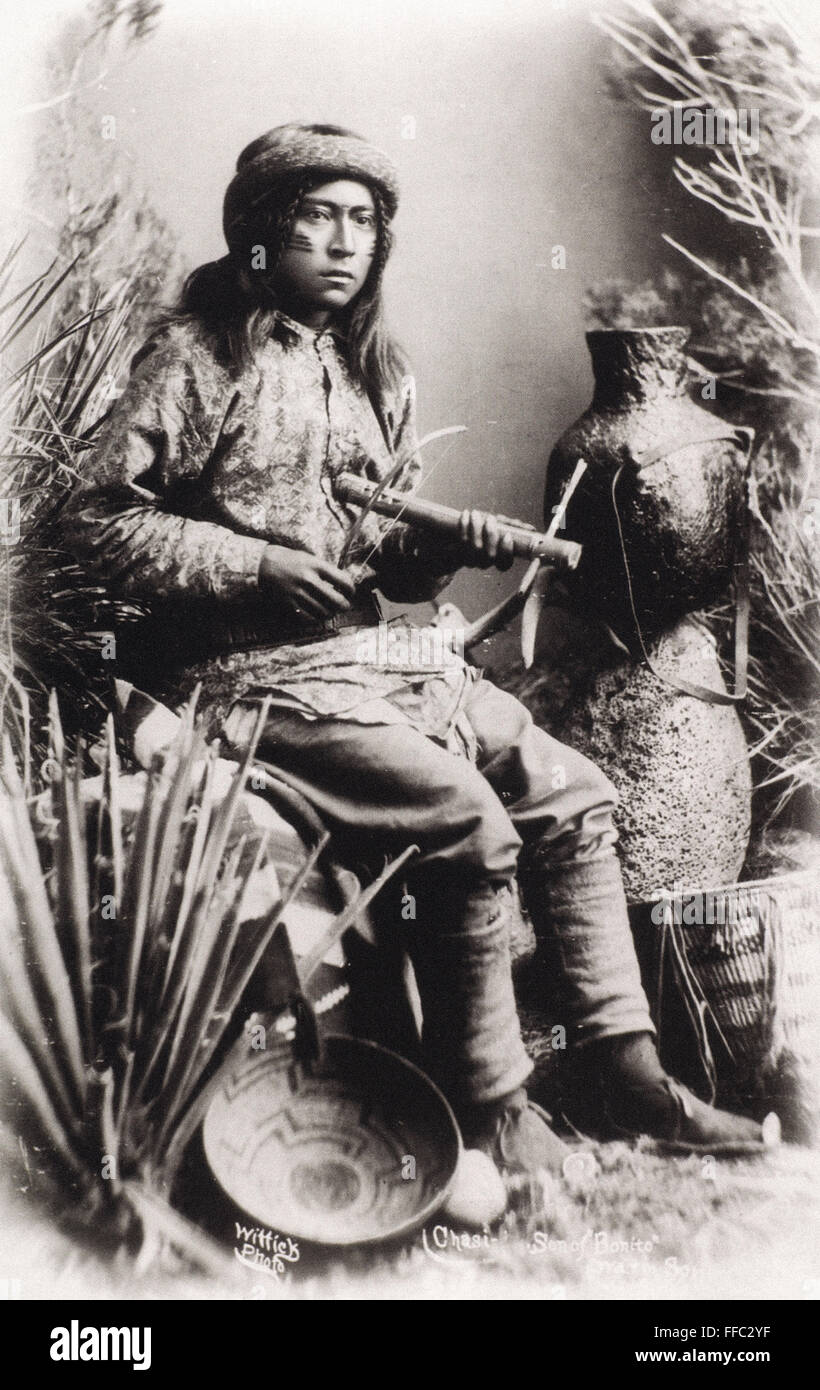 APACHE MAN. /nA young Chiricahua Apache man demonstrating a one-string ...