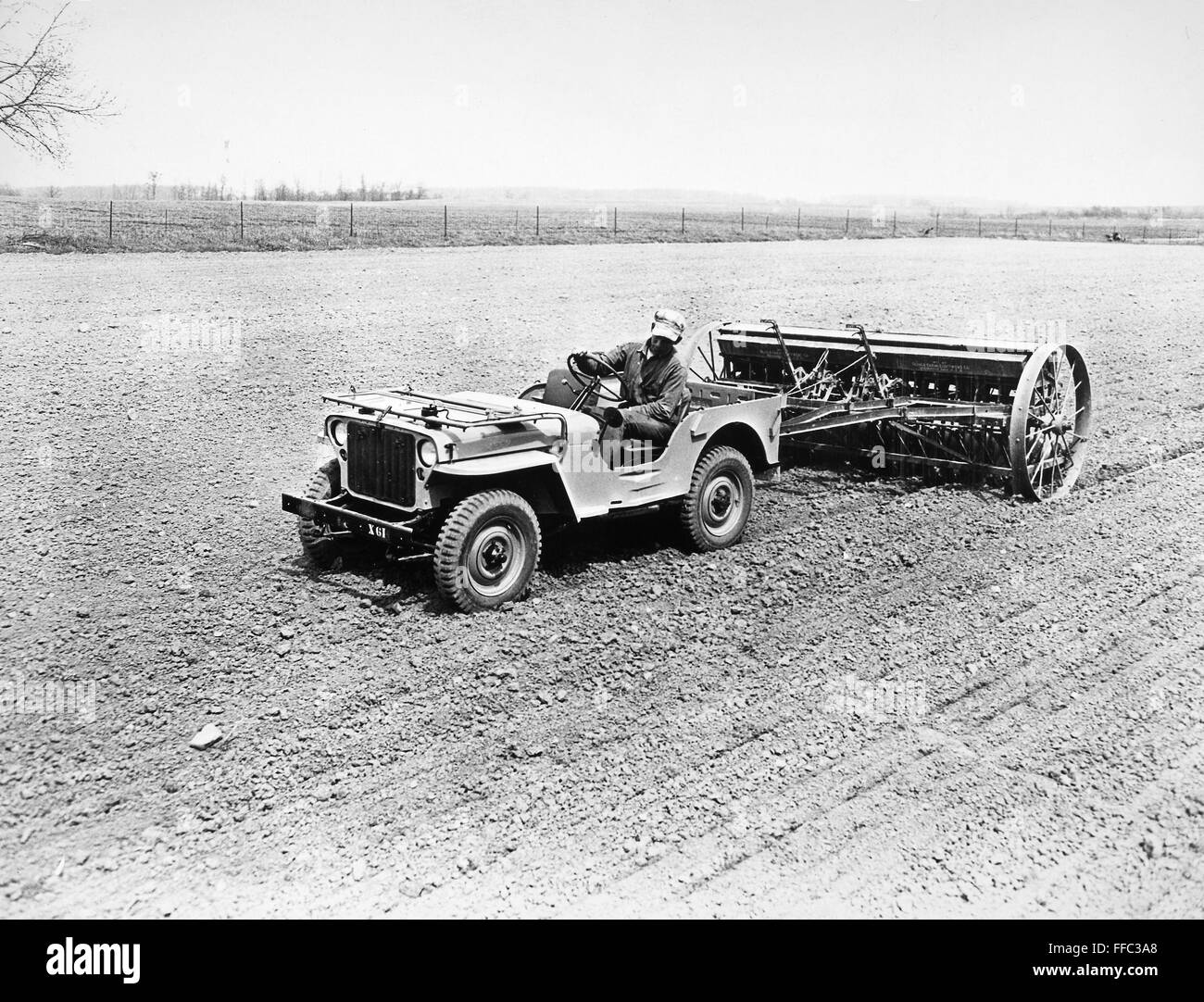 PLOUGHING WITH JEEP, 1945. /nA Willys-Overland postwar Jeep serves as a ...
