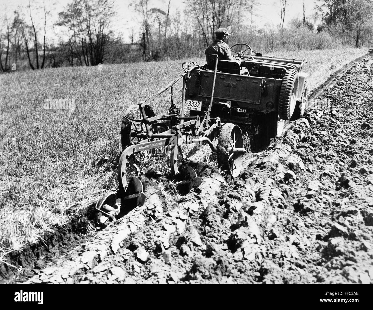POSTWAR JEEP FARMING, 1945. /nA Willys-Overland Jeep serves as a ...