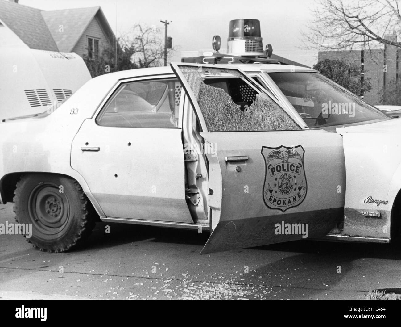 POLICE CAR, 1971. /nA police car after a shootout in Spokane ...