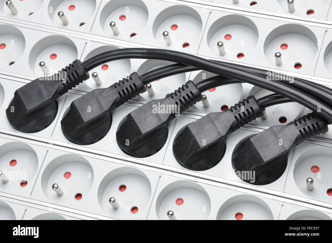 Electrical cords with power strips Stock Photo - Alamy