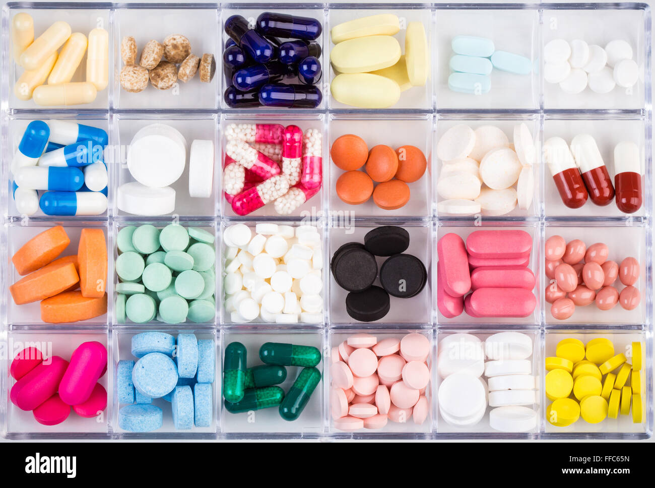 Various medicine pills and capsules in plastic container Stock Photo ...