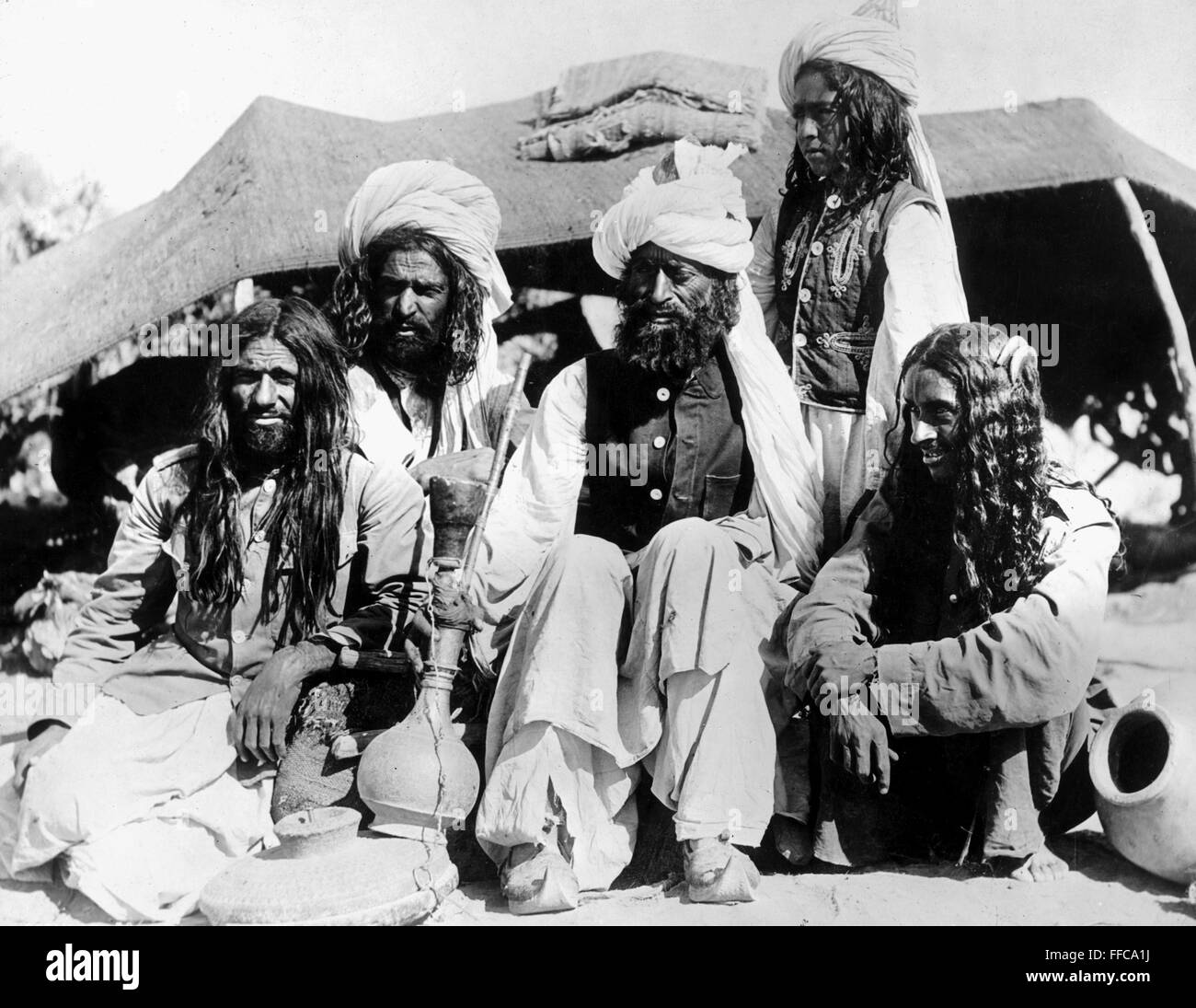 BALUCHISTAN CHIEF, c1930. /nA tribal chief (center) of Baluchistan with ...