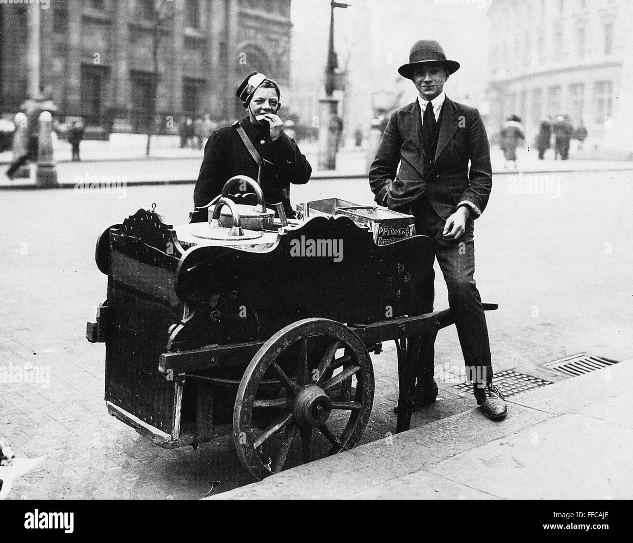 LONDON: TELEGRAM BOY. /nAn English telegram boy (left) pausing for ice ...