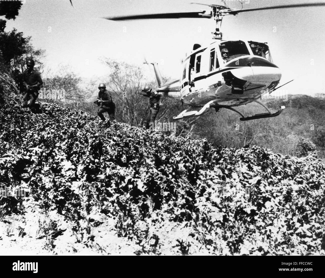 MEXICO: POPPY FIELD, 1977. /nMexican soldiers jump from a helicopter ...