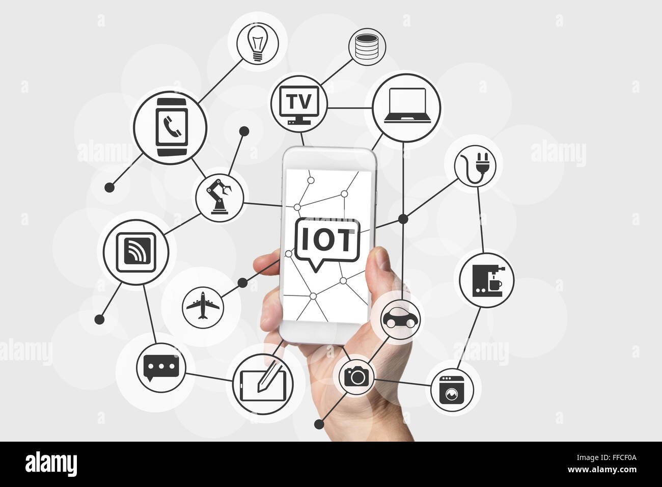 Internet of Things (IOT) concept with hand holding modern white and ...