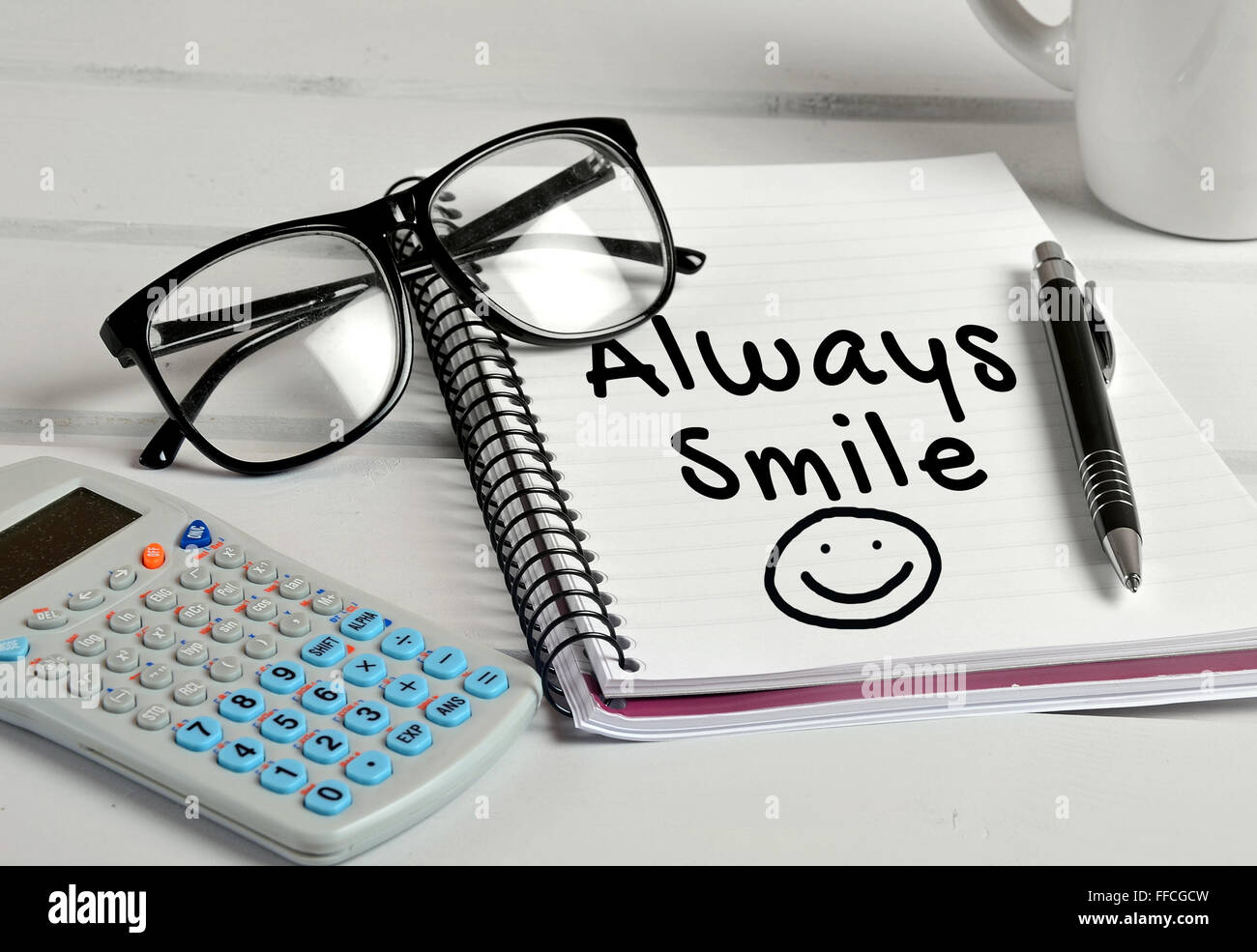 Always Smile word on notebook page Stock Photo - Alamy