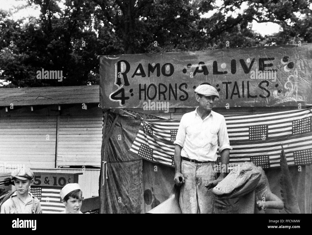 COUNTY FAIR, 1938. /nSideshow attraction at a county fair in central ...