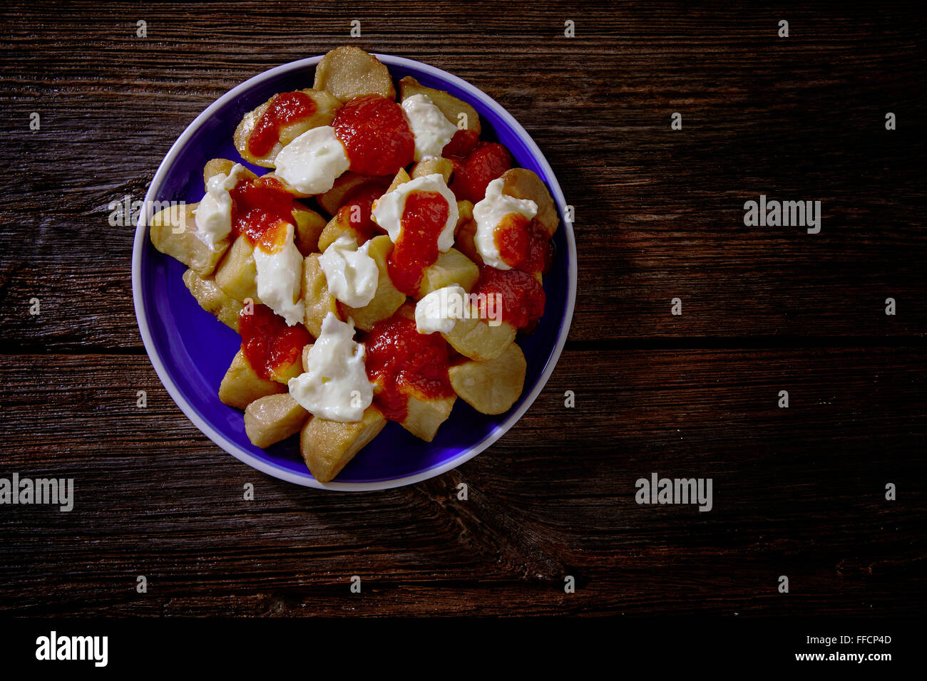 Tapas Patatas Bravas potatoe fries with tomato and mayonaise from Spain ...