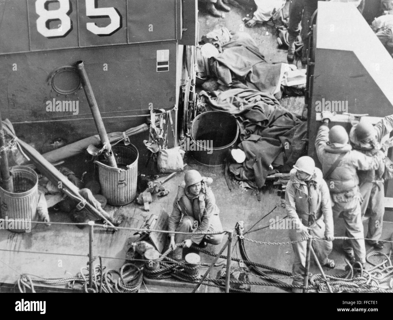 WORLD WAR II: D-DAY, 1944. /nU.S. Coast Guard landing craft listing and ...