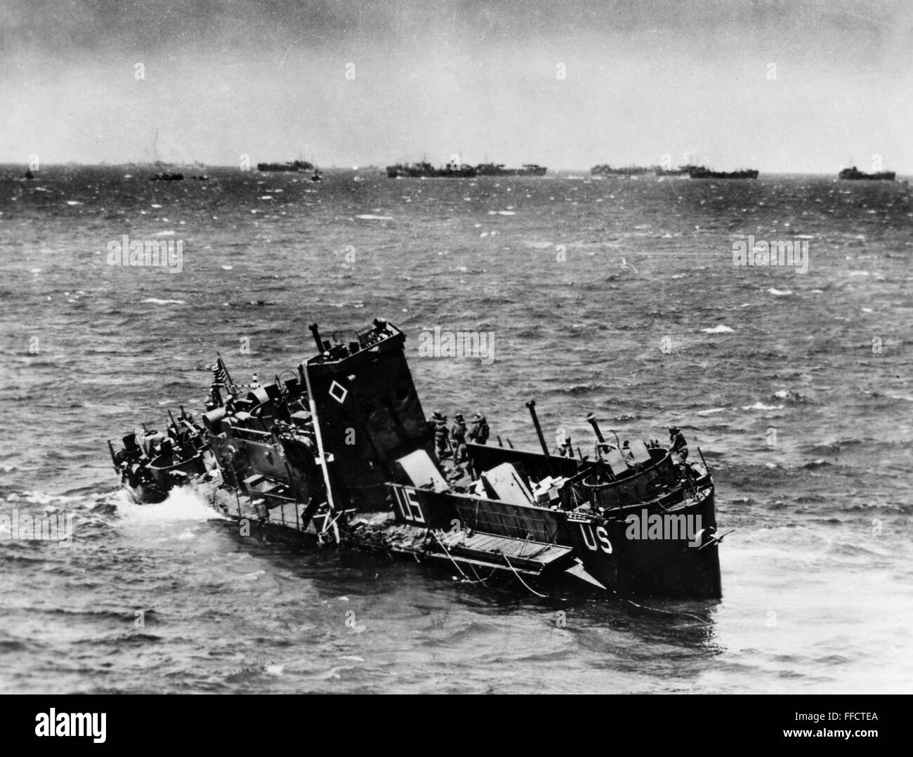 WORLD WAR II: D-DAY, 1944. /nU.S. Coast Guard landing craft sinks off ...
