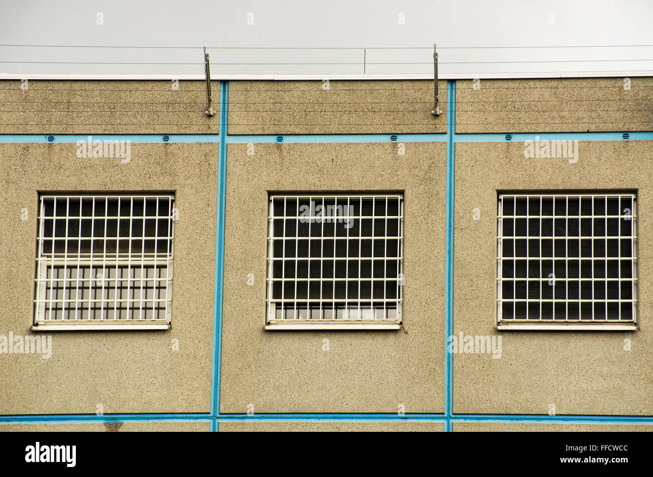 Prison windows with bars Stock Photo - Alamy