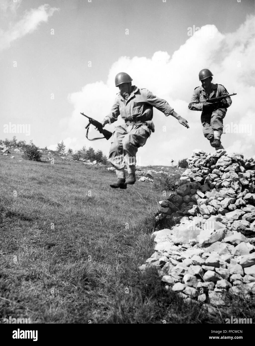 ITALIAN WAR EXERCISES, 1952. /nItalian infantrymen rush toward the ...