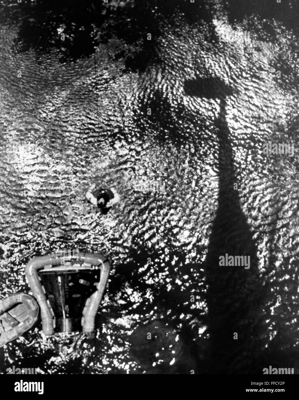 GEMINI IV: RECOVERY, 1965. /nAn astronaut of the Gemini IV is lifted to ...