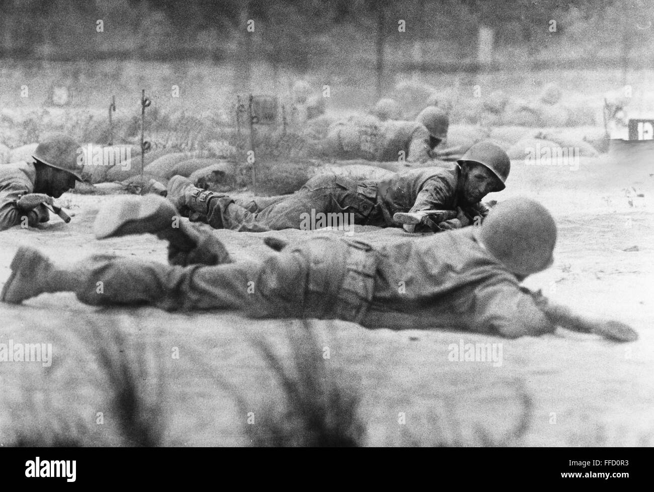 MILITARY TRAINING. /nSoldiers training on an infiltration course, mid ...