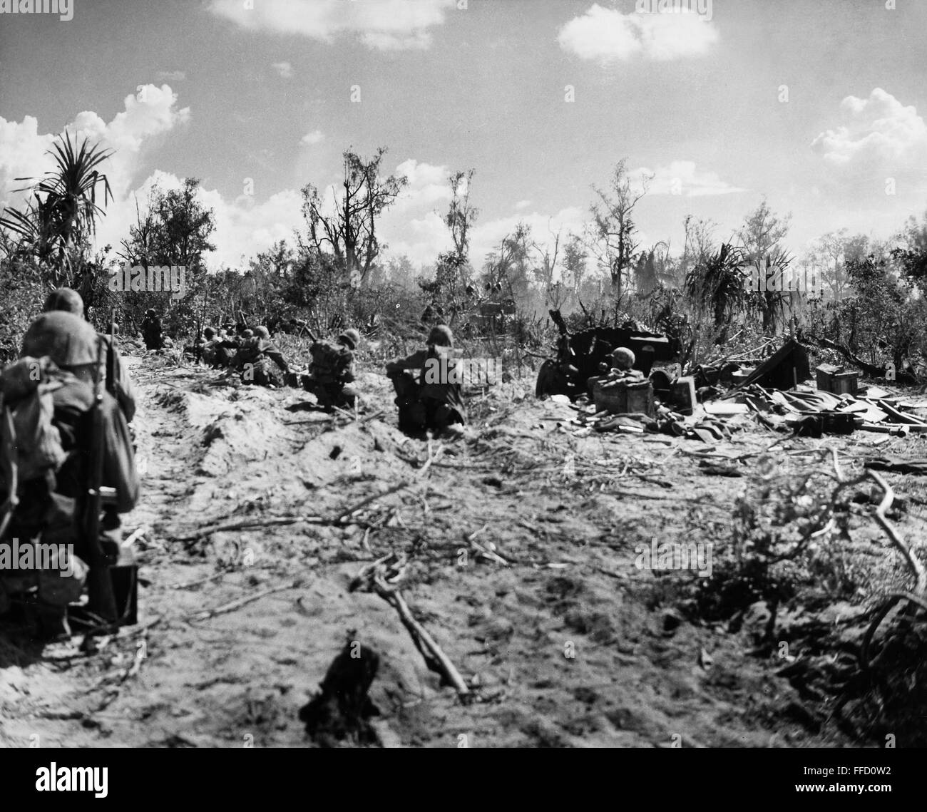 WORLD WAR II: PELELIU. /nU.S. Marines wait for a tank to destroy a ...