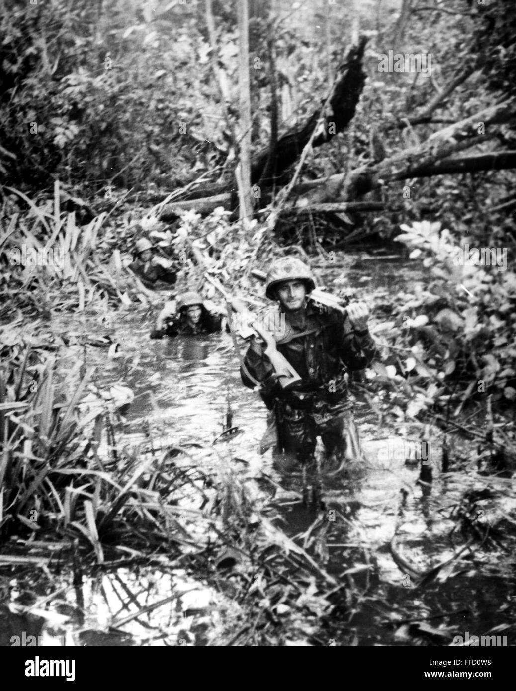 WORLD WAR II: NEW BRITAIN. /nU.S. Marines advancing through the jungle ...