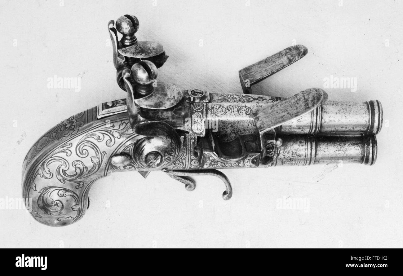 DOUBLE BARREL PISTOL. /n17th or 18th century handgun Stock Photo - Alamy