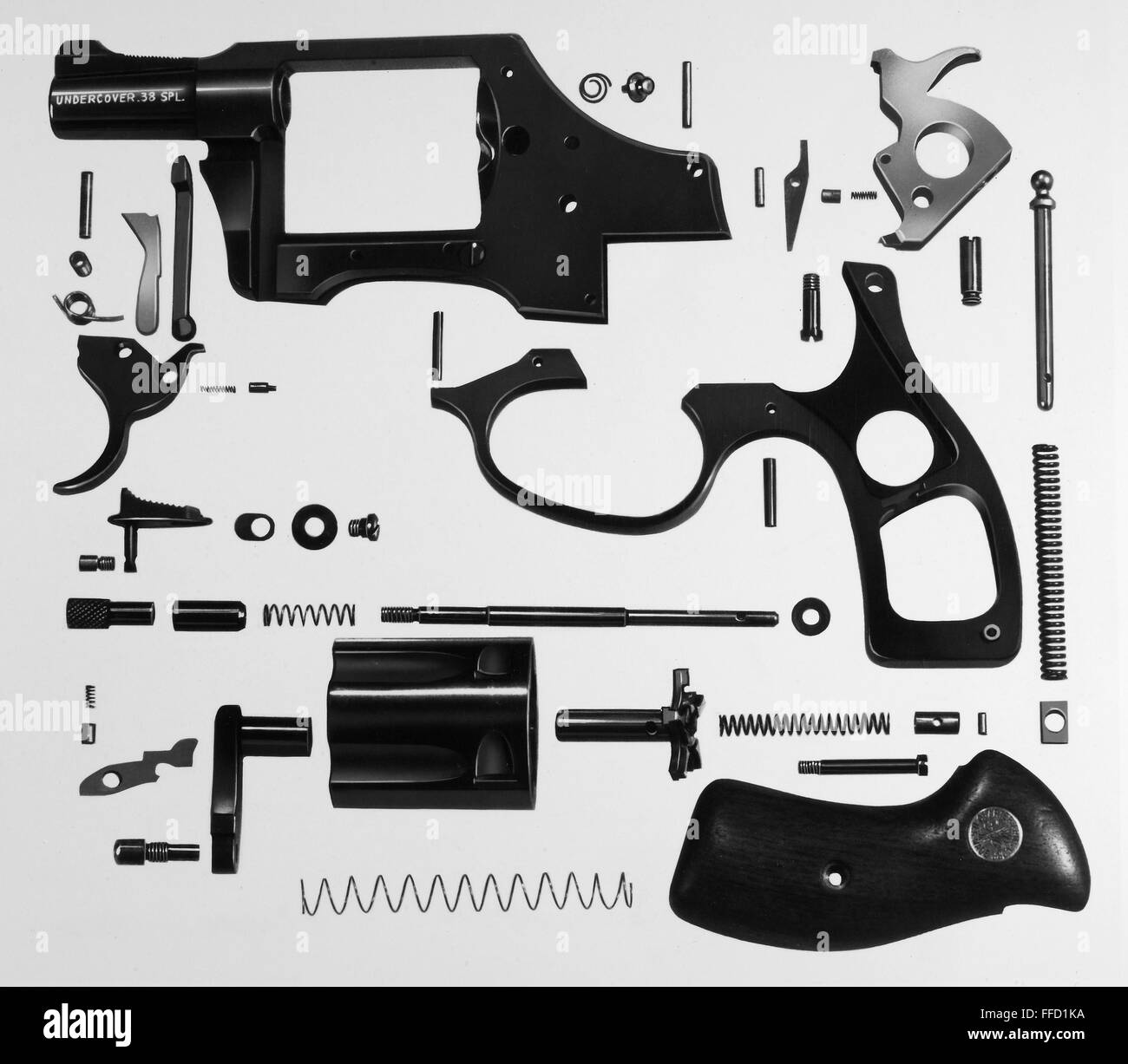 CHARTER ARMS REVOLVER. /nA disassembled Charter Arms Undercover .38 ...