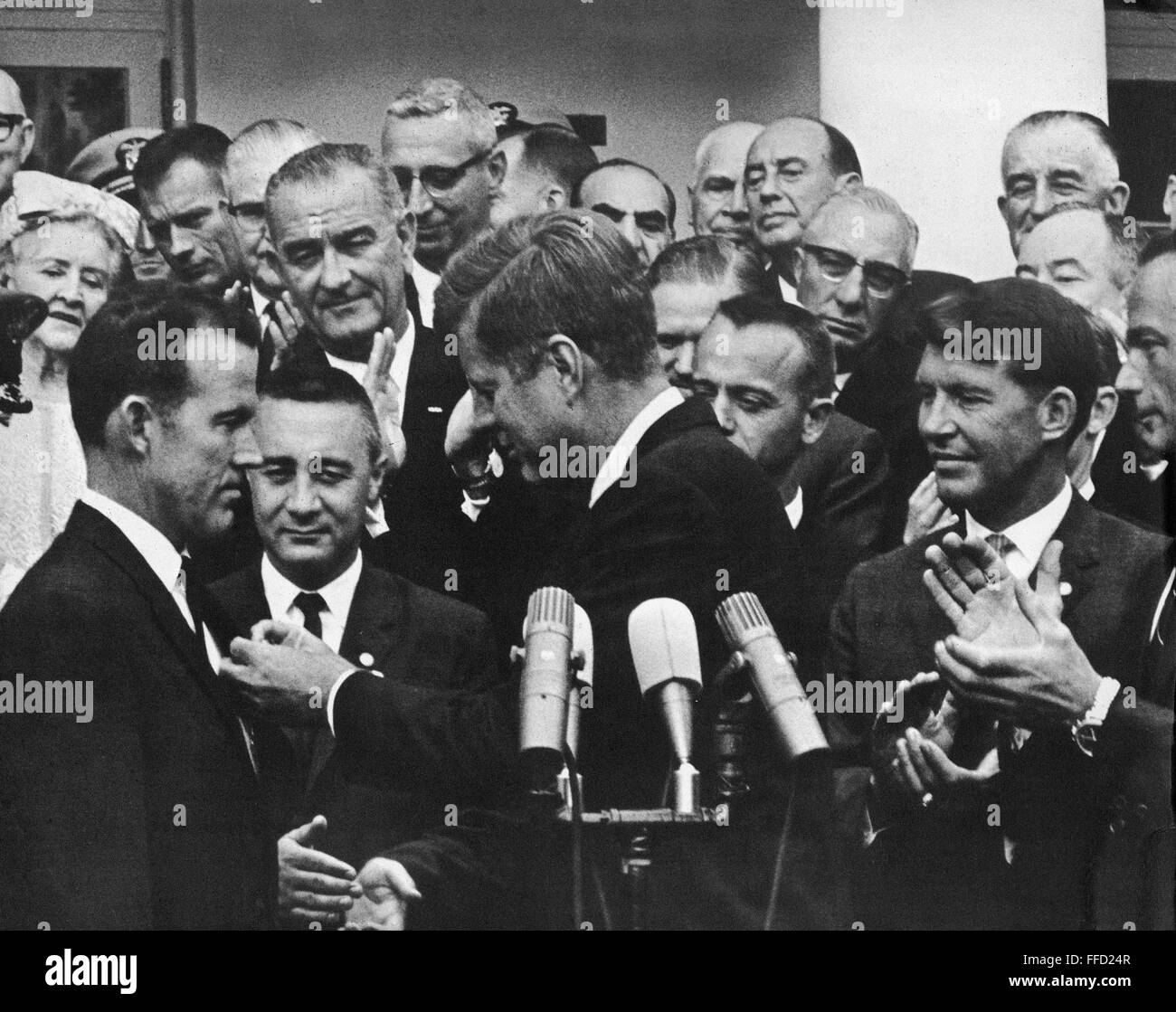 KENNEDY & COOPER, 1963. /nPresident John F. Kennedy pins NASA's ...