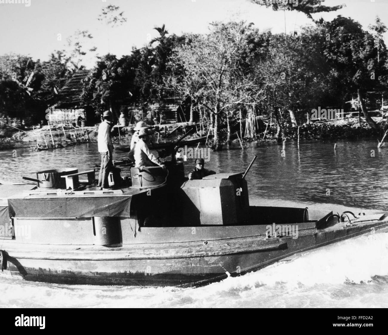 VIETNAM WAR: PATROL BOAT./nA South Vietnamese Navy patrol boat scans ...