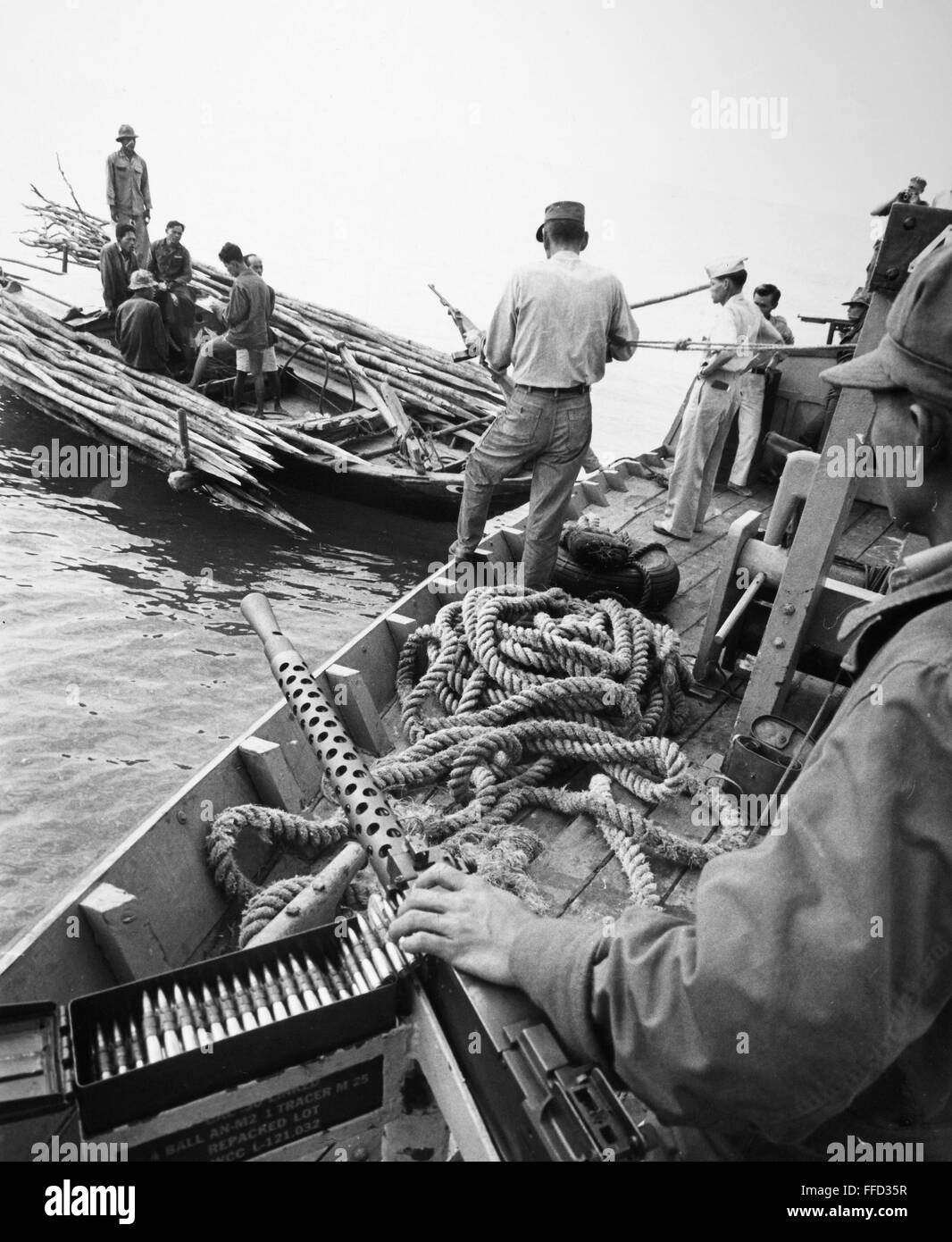 VIETNAM WAR: RIVER CONTROL. /nTwo U.S. Navy men onboard a Vietnamese ...