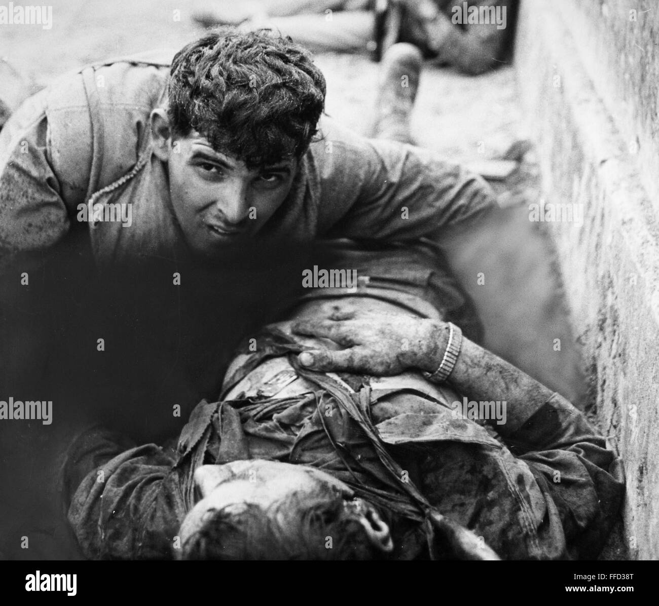 VIETNAM WAR: DYING SOLDIER. /nA U.S. Marine tries to comfort a dying ...