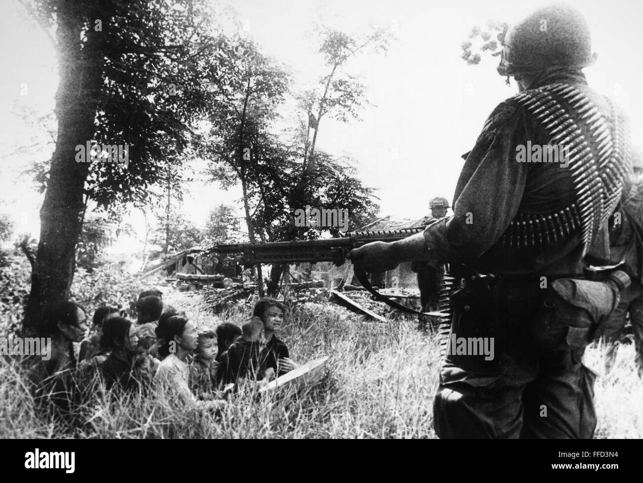 VIETNAM WAR: GUARD. /nAn American machine gunner stands guard over ...