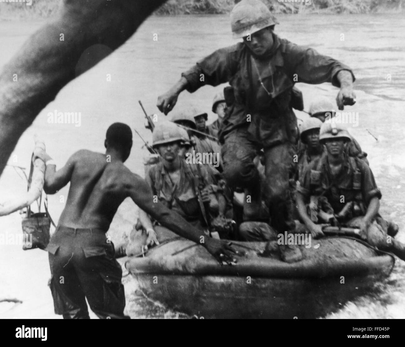 VIETNAM: SEARCH AND DESTROY. /nAn American paratrooper leaps from a ...