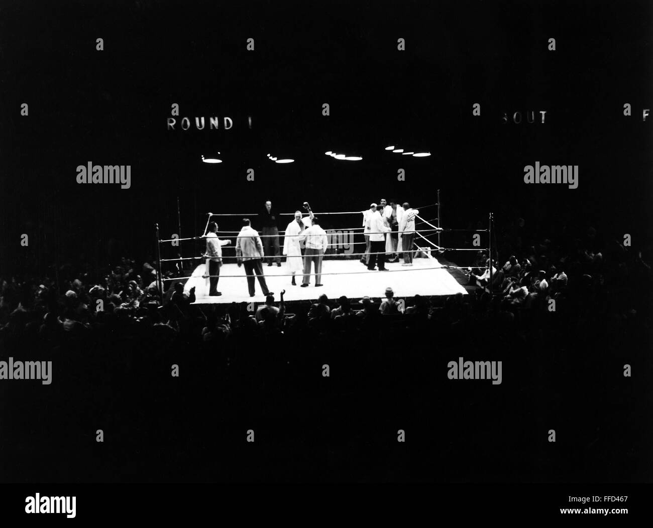 BOXING MATCH: WINNER. /nThe winner raising his arm at the end of a ...