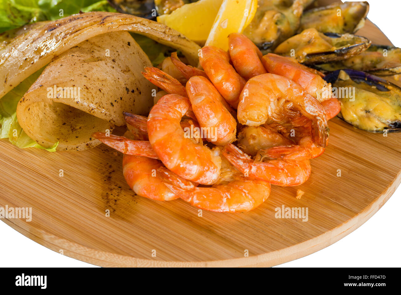Shrimps, mussels, fish with lemon Stock Photo - Alamy