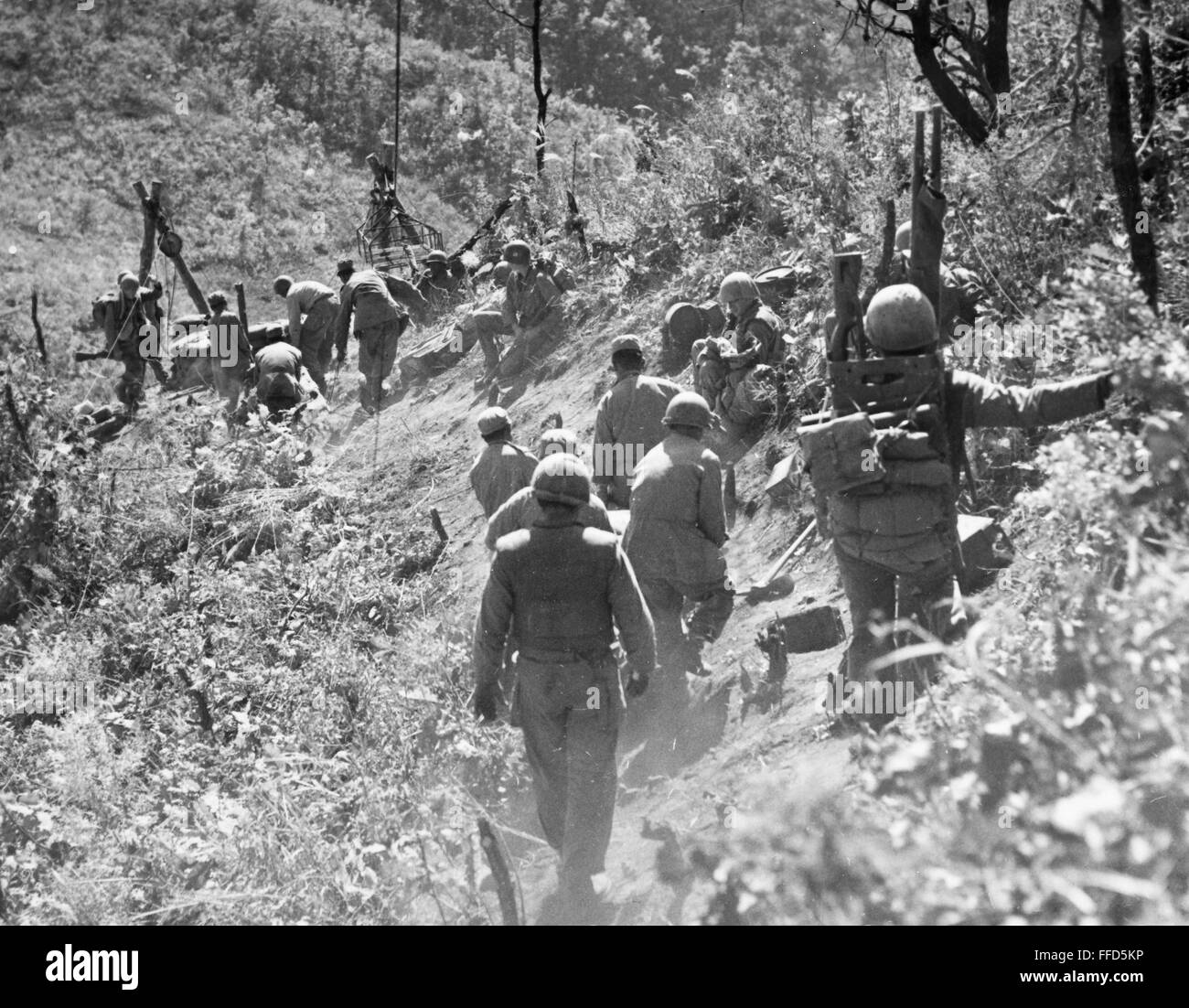 KOREAN WAR: TRIANGLE HILL. /nAmerican soldiers carrying an injured ...