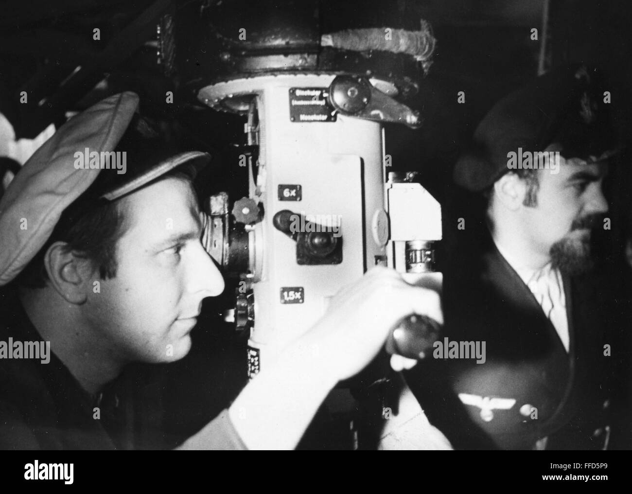 WORLD WAR II: U-BOAT, 1943. /nCrew member looking through the periscope ...