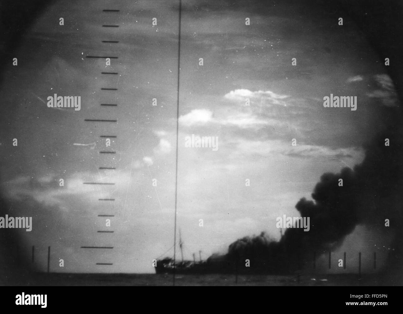 WORLD WAR II: SUBMARINE. /nA Japanese merchant ship burning following ...
