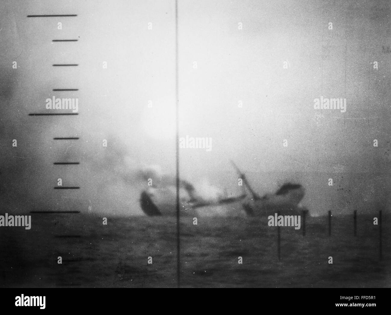 WORLD WAR II: SUBMARINE. /nA Japanese merchant ship sinking following ...