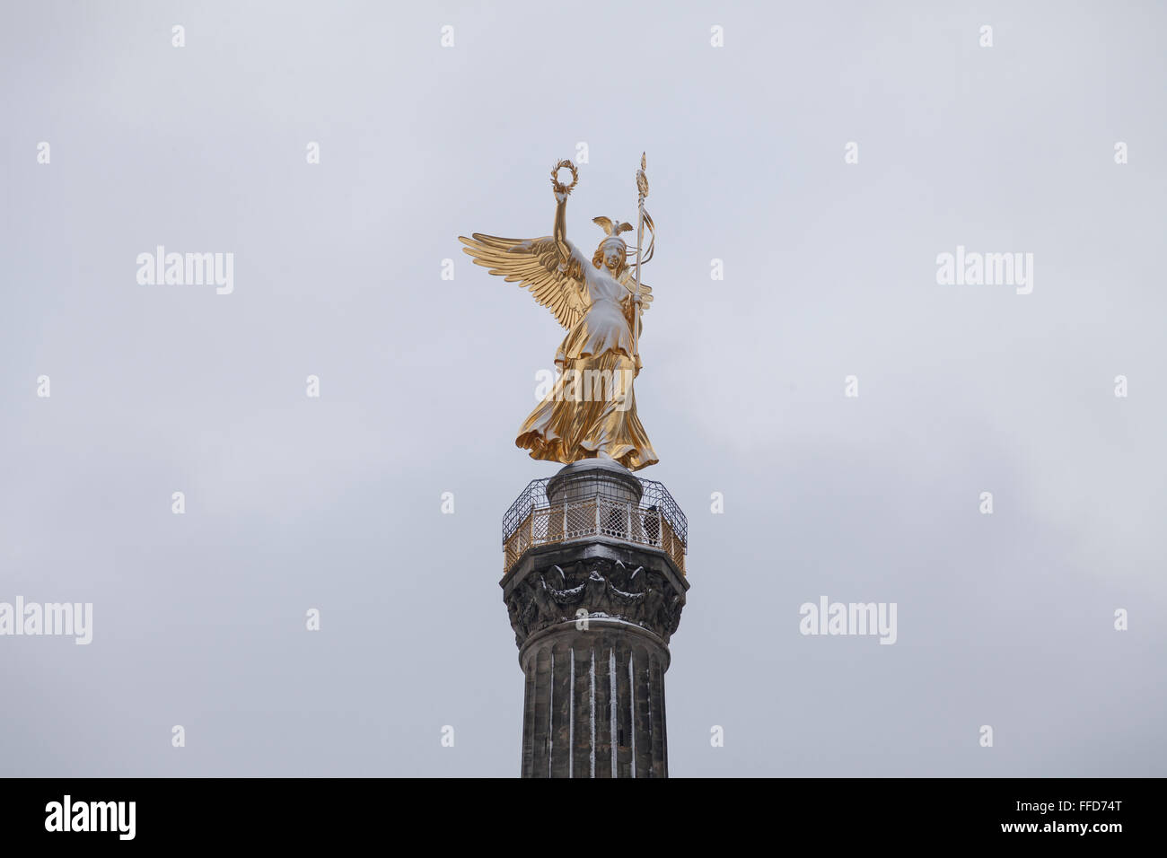 statue with snow on victory column in berlin Stock Photo - Alamy