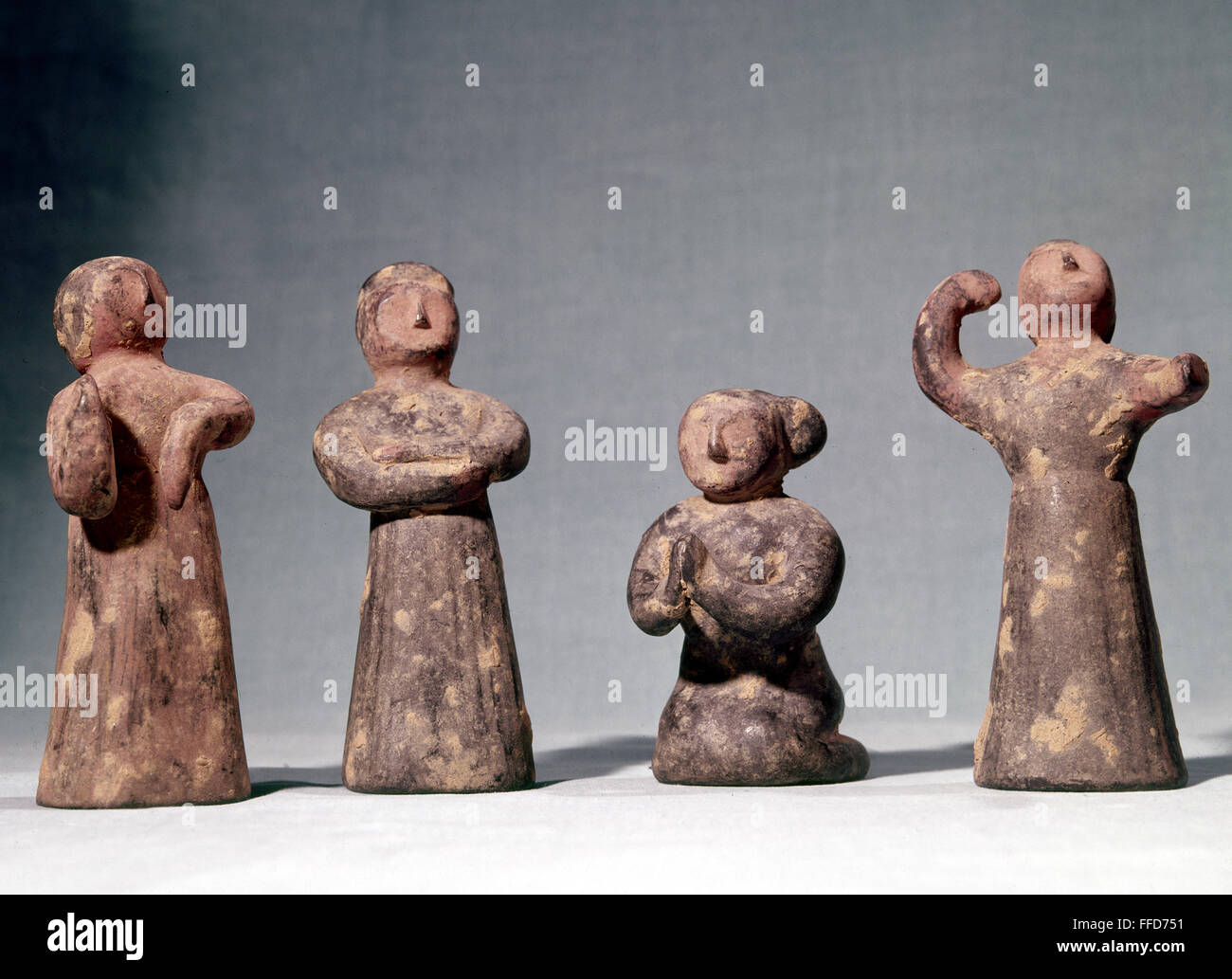 CHINA: POTTERY FIGURES. /nBlack pottery figures of mourners, Chinese ...