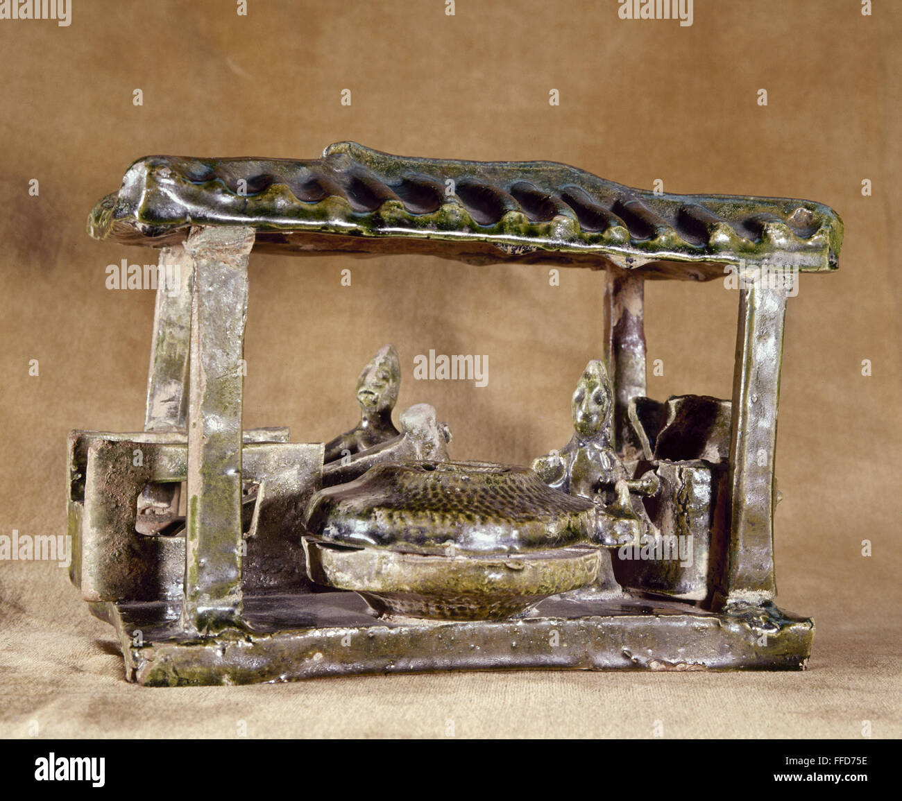 CHINA: GRAIN MILL. /nGlazed clay model of a Chinese grain mill, Han ...