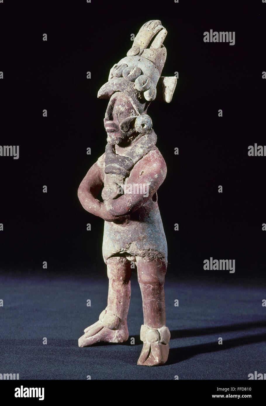 MAYAN NOBLE, 700-900 A.D. /nCeramic Mayan figure whose boots and ...