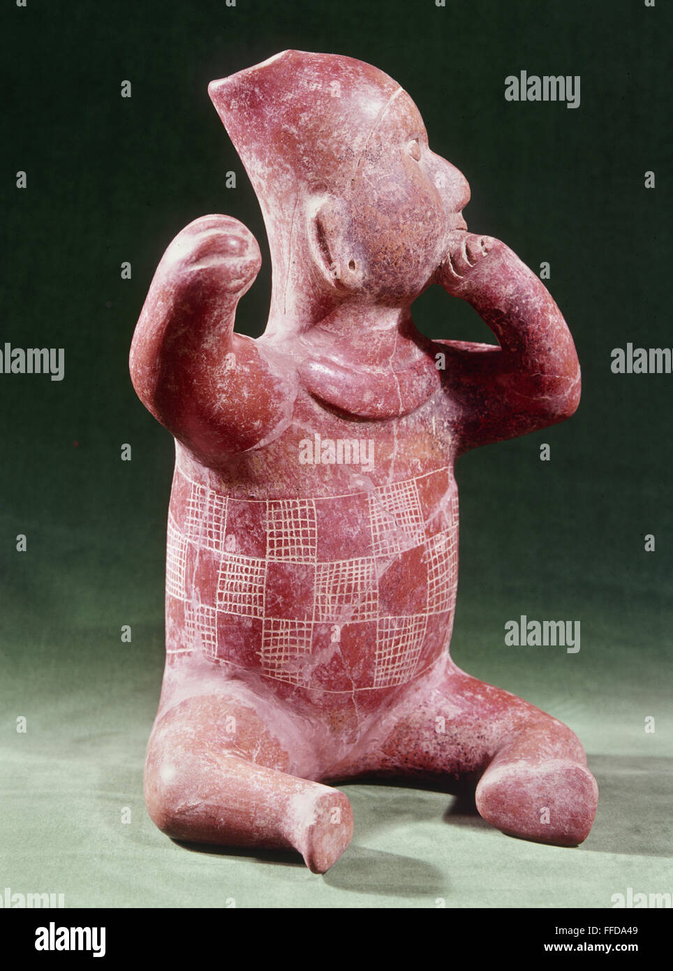 MEXICO: TLATILCO FIGURE. /nSeated clay figure with a checkerboard ...