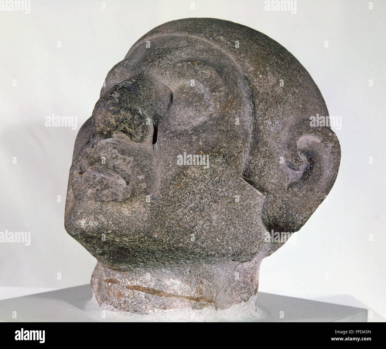 MEXICO: OLMEC HEAD. /nCarved stone head with helmet. From the Olmec ...