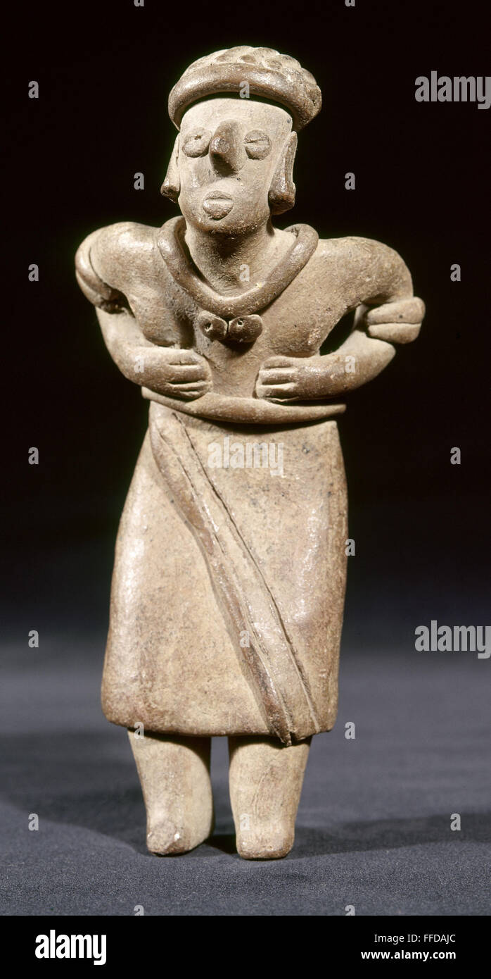 MEXICO: CLAY FIGURE. /nClay figure of a man holding his stomach. From ...