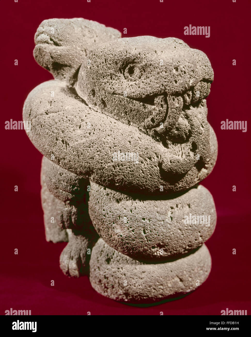 AZTEC SNAKE, 1250-1500 A.D. /nStone sculpture of a snake strangling a ...