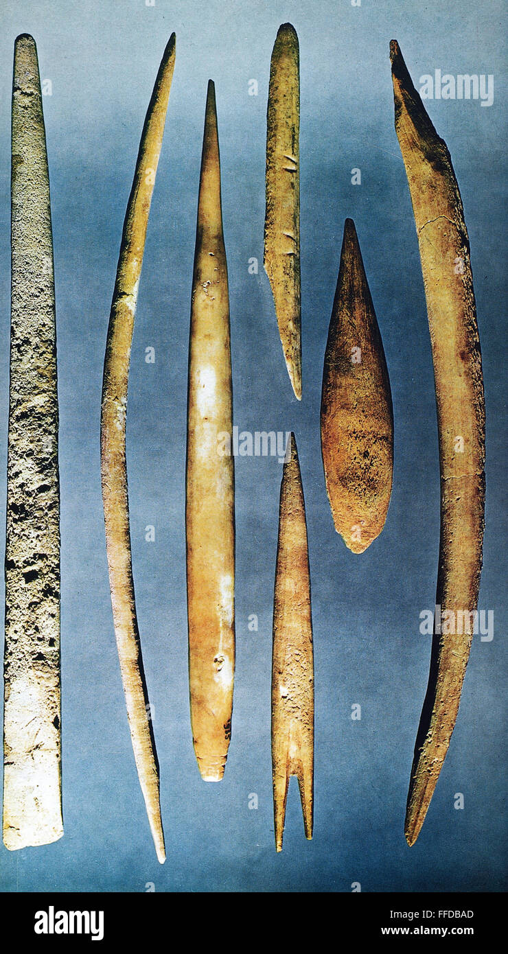 PALEOLITHIC SPEARS. /nVarious paleolithic spears made from bone or antler, ranging from c35,000 ...