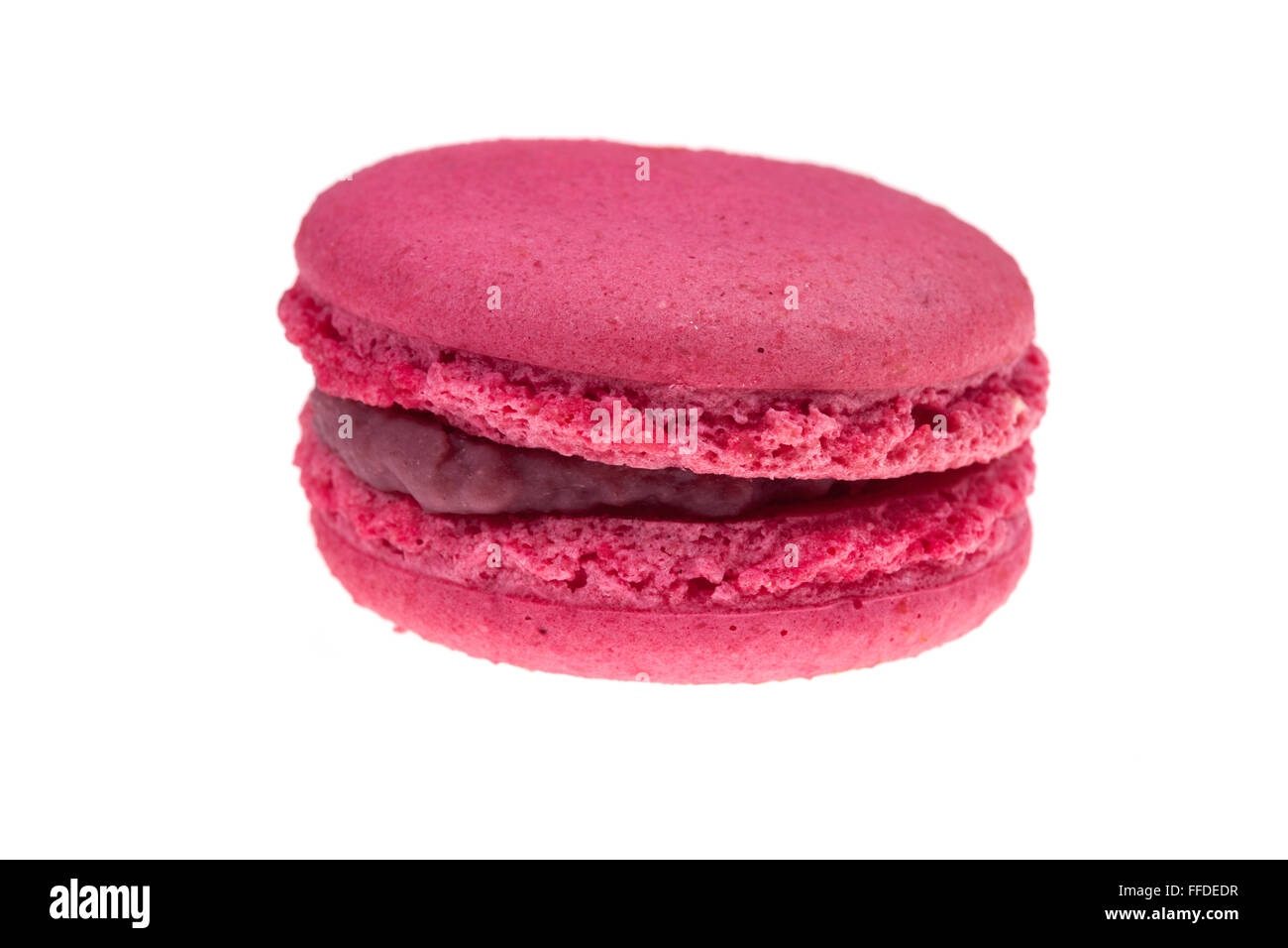 one pink macaroon isolated on white Stock Photo - Alamy